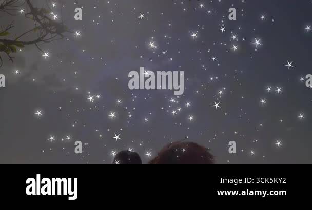 Camera panning over twilight sky with star overlay in travel ad, couple ...