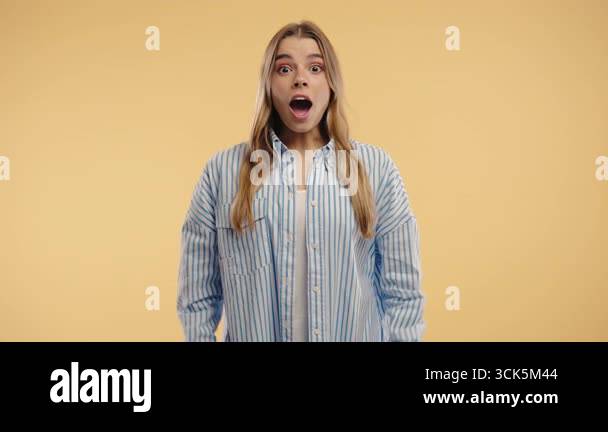 Surprised Charming blonde Woman, expresses WOW, cant believe. Impressed ...