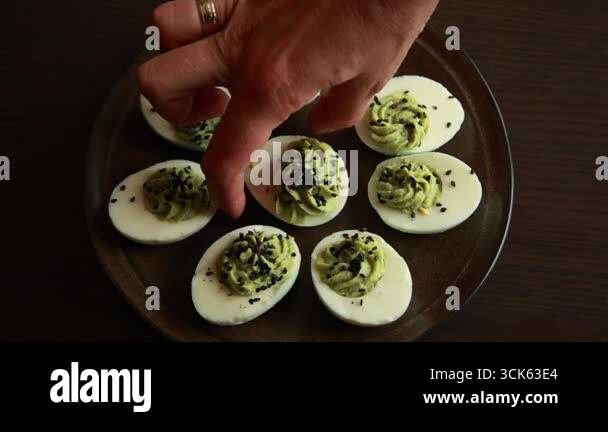 rotten-style green devil eggs served as spooky Halloween party finger ...