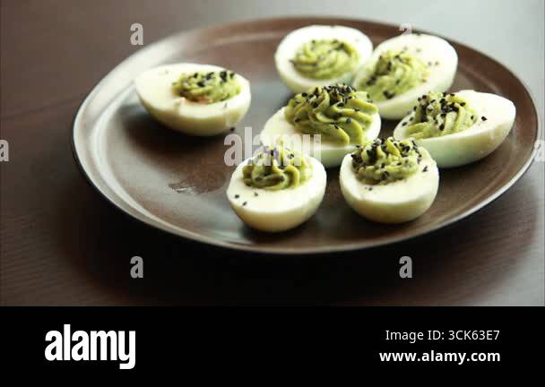 rotten-style green devil eggs served as spooky Halloween party finger ...