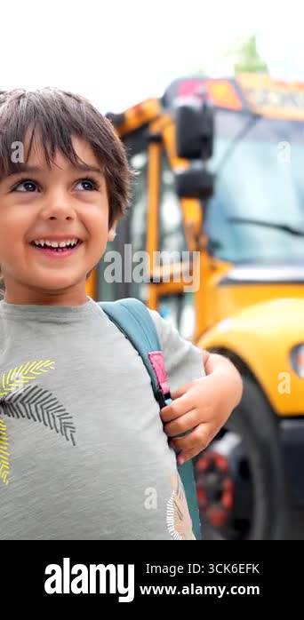 Happy schoolboy adjusting his backpack straps. Getting ready for his ...