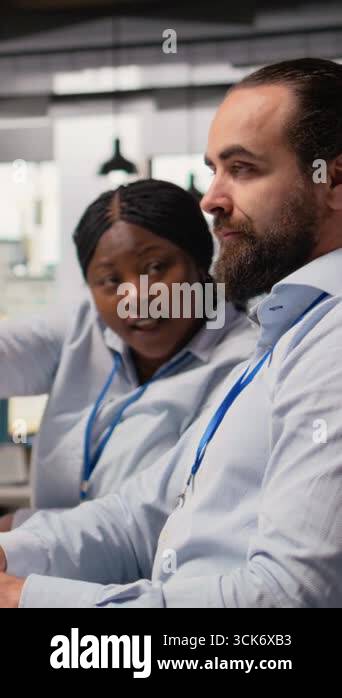 Research and development office coworkers use CAD program to upgrade ...