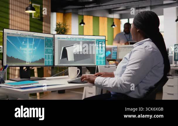 Engineer working on portable solar energy gadget designed with new ...