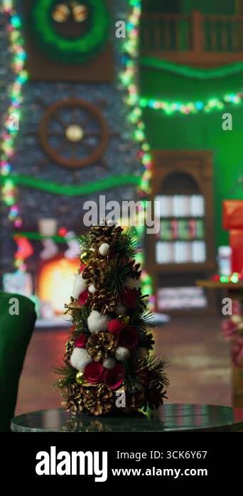 Vertical video Christmas pine tree full of colorful garlands and ...