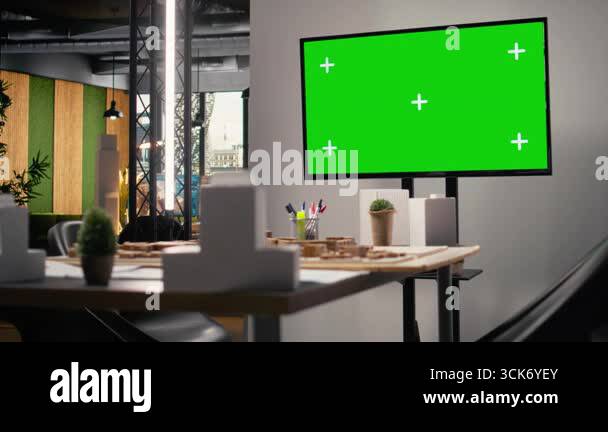 Corporate innovation hub featuring empty office and mockup on screen ...