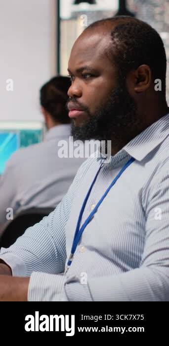 Technician uses software to plan wind farm layouts, determining optimal ...