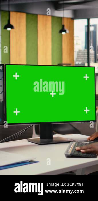 Engineer uses digital modeling tool on isolated screen computer to develop smart electric grid ...