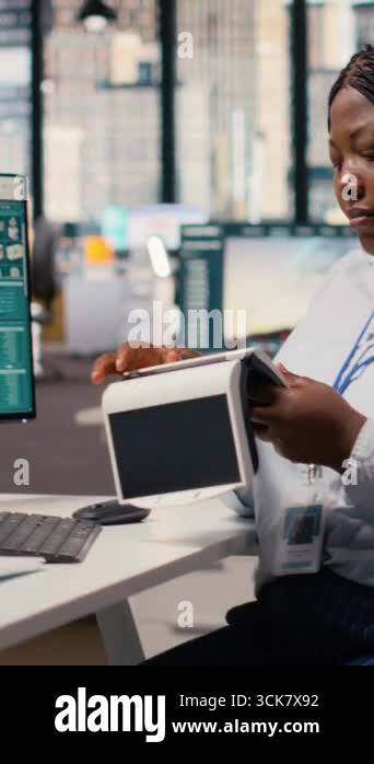 Product developer in office using advanced solar cell technology to ...