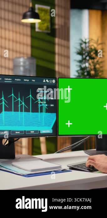 Engineer using software on green screen mockup PC used for planning ...