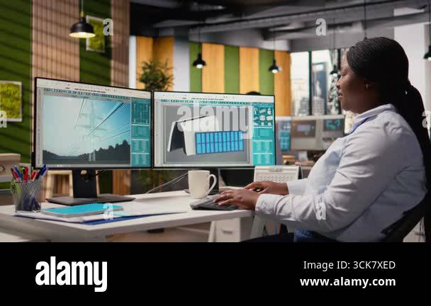 Engineer in office develops innovative solar powered device using ...