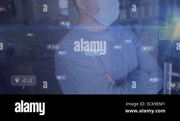 Masked man standing in office initiating floating social media stream cycling engagement metrics ...