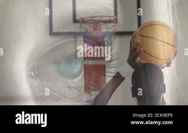 Shifting ball, male athlete preparing jump shot with AR eye overlay and ...
