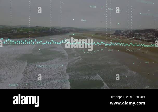 Drone ascending over coastline, capturing waves while animated data ...