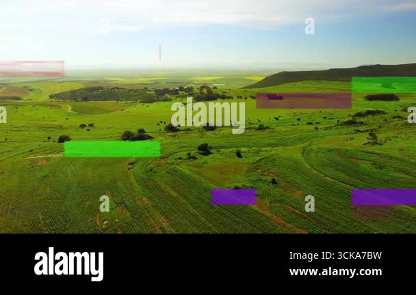 On start colored rectangles fading, sliding, scaling over farmland ...