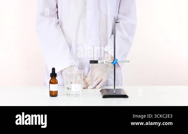 Chemical experiment demonstrating a precipitation reaction Stock Video ...