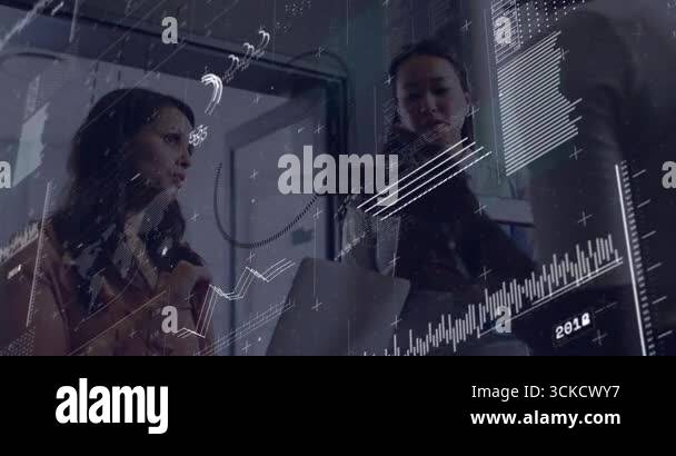 business team leaning laptop initiating data overlay scrolling tablet ...