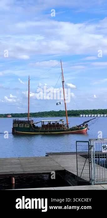 Bitterfeld, Germany - August 1, 2025: A bright pirate ship with two ...