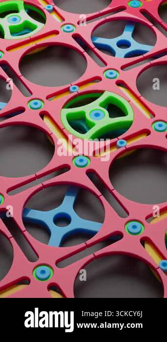 Colorful abstract mechanical structure with interlocking circular and ...