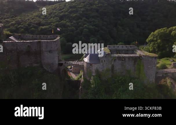 Explore the majestic Bouillon Castle, nestled in the lush greenery of ...