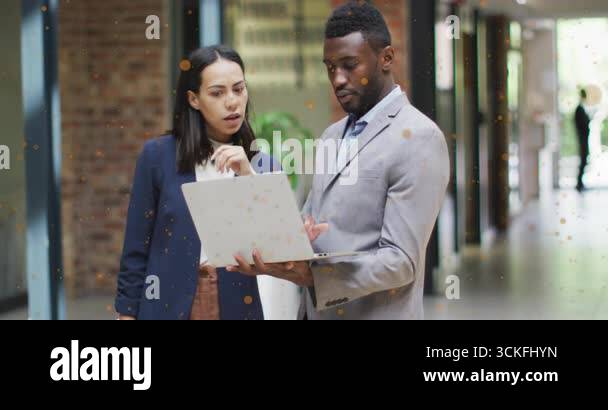 Man tapping trackpad and scrolling laptop while woman leaning and ...