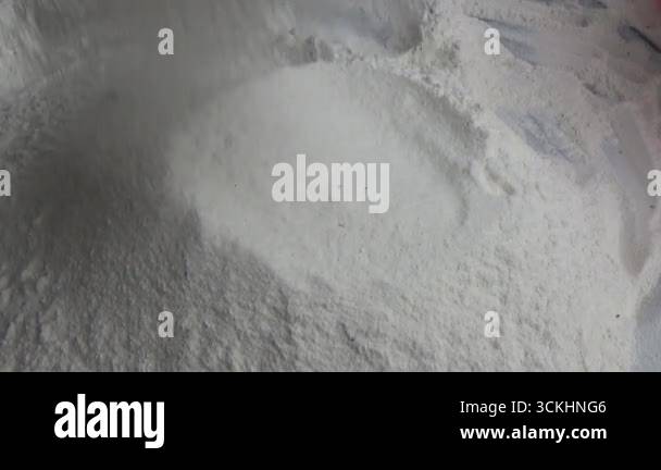 hand of farmer using basket to clean flour Stock Video Footage - Alamy
