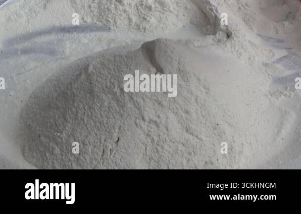 hand of farmer using basket to clean flour Stock Video Footage - Alamy