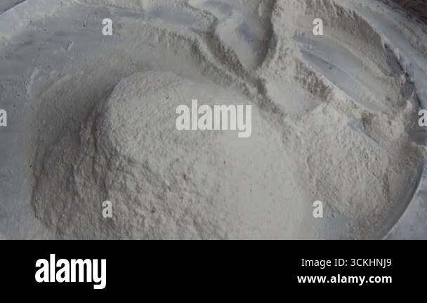 hand of farmer using basket to clean flour Stock Video Footage - Alamy
