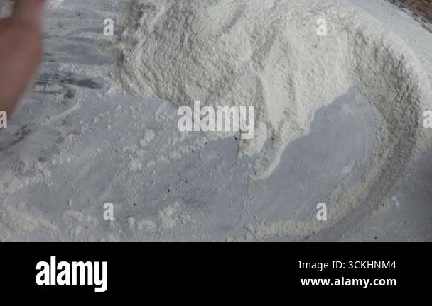 hand of farmer using basket to clean flour Stock Video Footage - Alamy