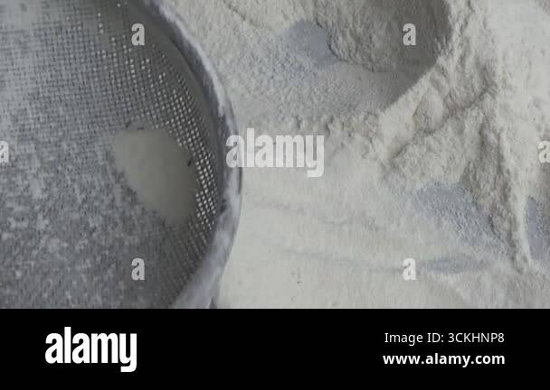 hand of farmer using basket to clean flour Stock Video Footage - Alamy