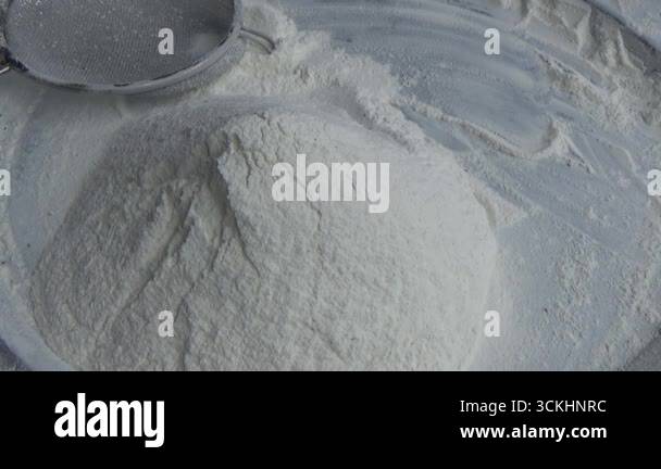 hand of farmer using basket to clean flour Stock Video Footage - Alamy