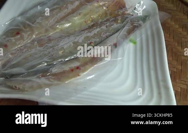 Dried marinated sea fish Stock Video Footage - Alamy