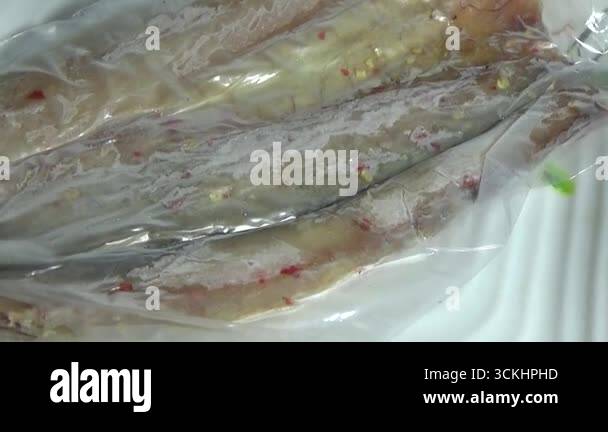 Dried marinated sea fish Stock Video Footage - Alamy
