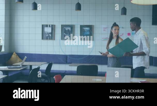 Coworkers walking office lounge, tapping phone activating holographic charts for business review ...