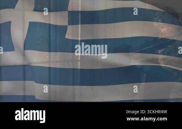 Greek flag stripes fluttering revealing soldier raising rifle and ...