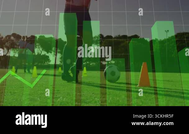 Mid adult coach placing ball starting dribbling cones drill with ...