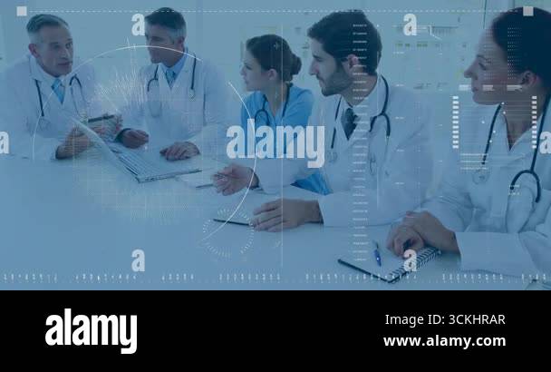 Senior doctor opening tablet showing patient data while team reviewing ...