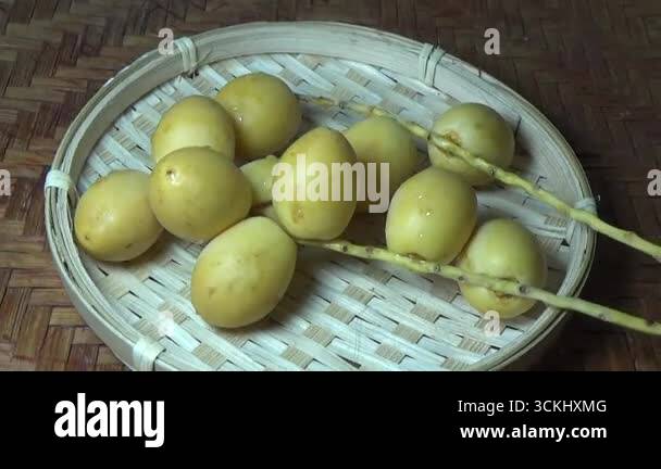 woman picking dates for lunch Stock Video Footage - Alamy