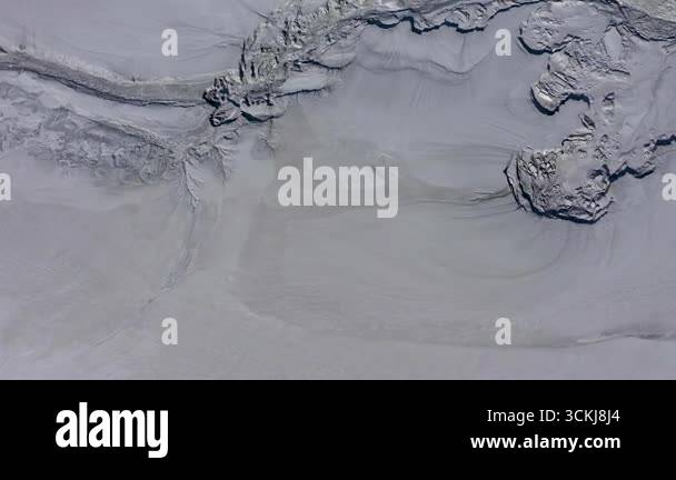 Aerial view of gray abstract mud patterns and cracks on acid mine ...
