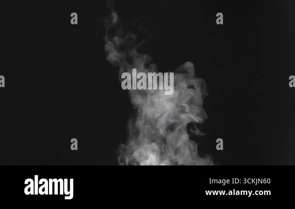 Surface of the Hot Water Creates Steam. A stream of white steam, slowly ...