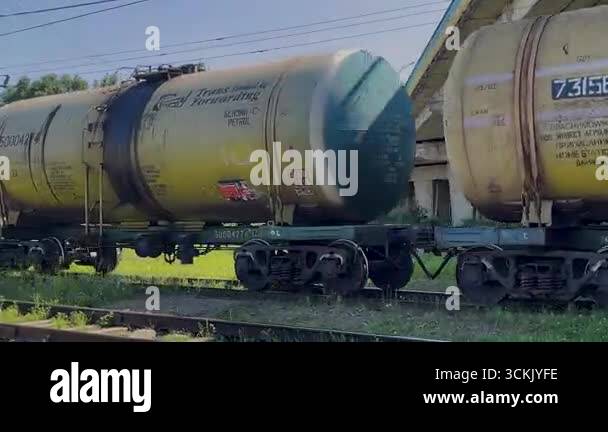 Kharkiv, Ukraine - August, 16, 2025: A freight train with round tank ...