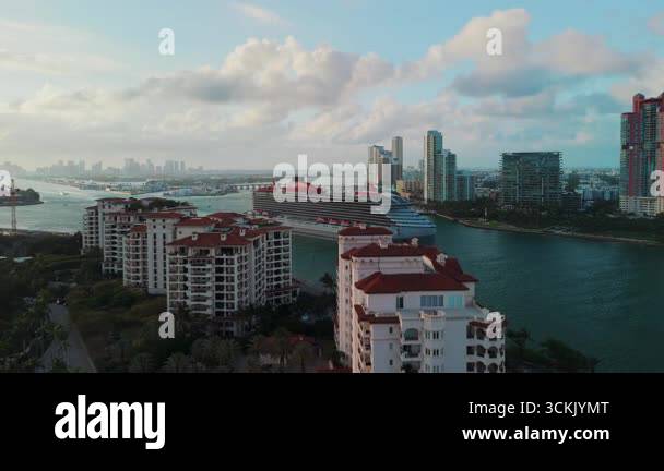 The large cruise liner slowly departing from the Miami port with ...