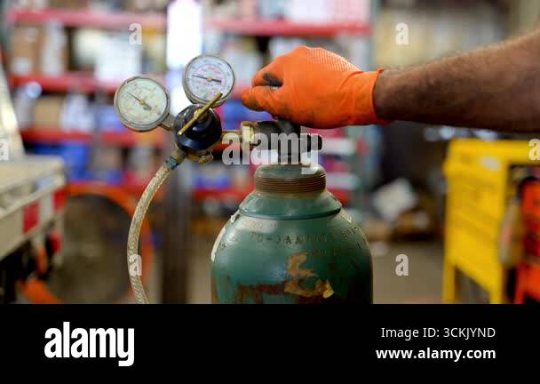 Oxygen cylinders for welding industry. Oxygen cylinder with compressed ...