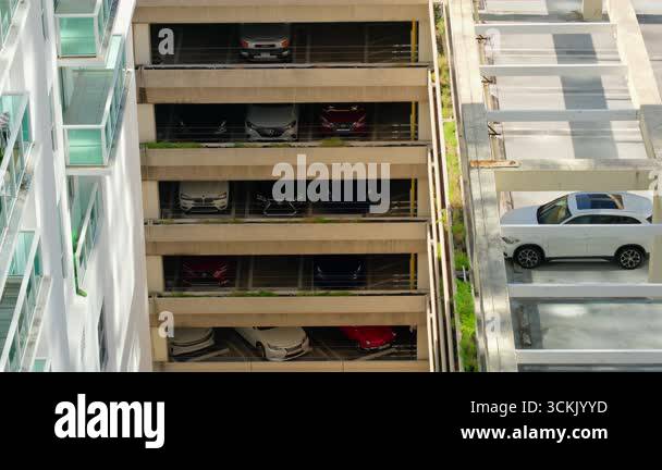 City infrastructure in downtown with multilevel parking and roof ...