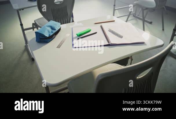 Close Up of School Desk with Student School Supplies: Pencil Case, Pens ...