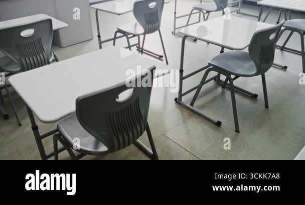 Interior of Modern Empty Elementary School Classroom with Working Desks and Chairs for Students ...