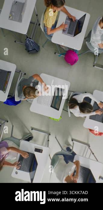 Primary School Students Working on Creative Projects on Laptops ...