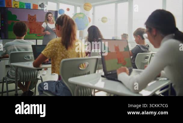 Primary School Students Creating Digital Illustrations on Laptops in ...