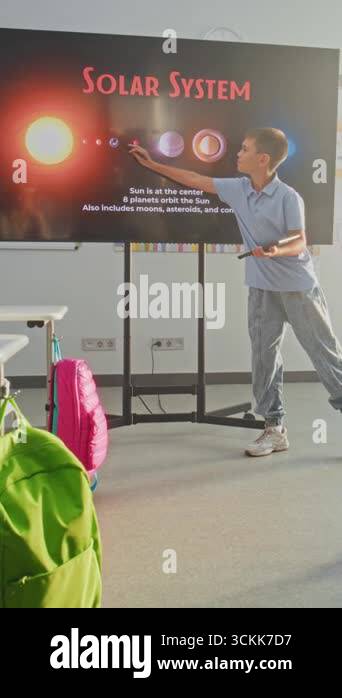 Primary School Boy with Tablet Computer Showcasing Knowledge of ...