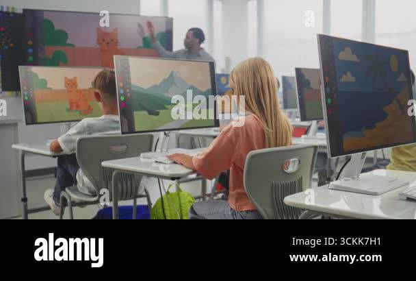 Primary School Students Drawing Pictures on Computers, Working on ...