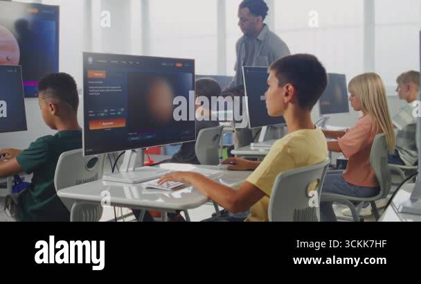 Primary School Students Working on Computers, Creating Video Projects ...